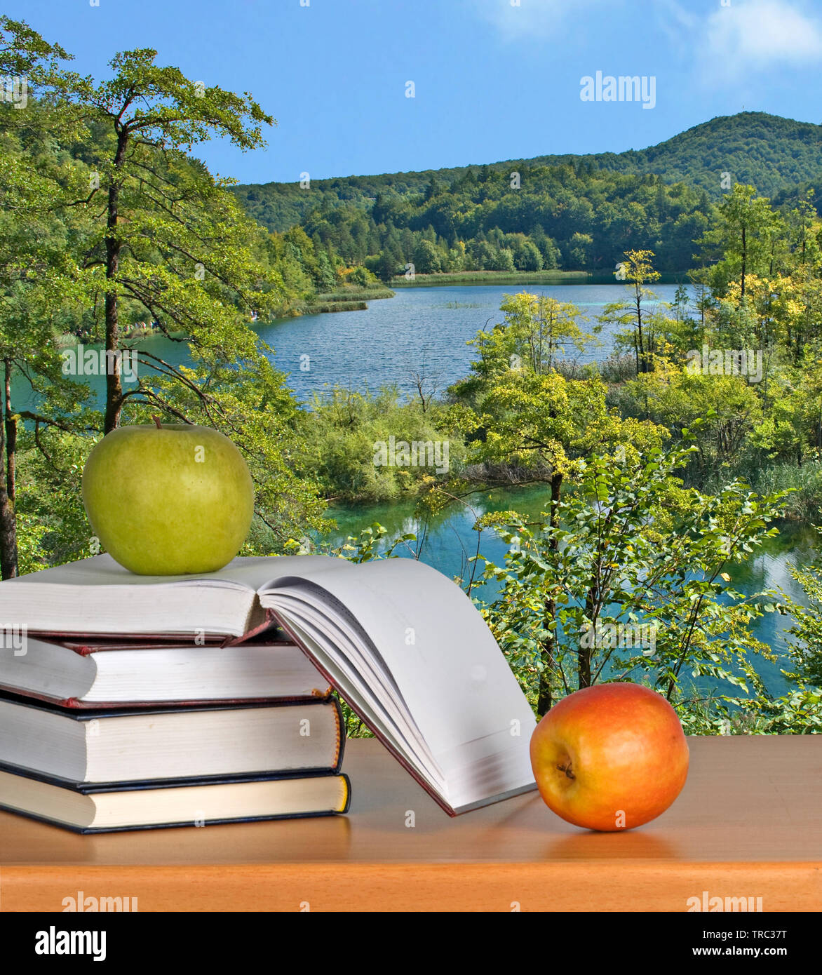 Books with apples Stock Photo - Alamy