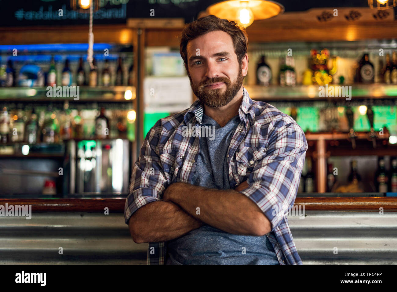 Man leaning against counter on hi-res stock photography and images - Alamy