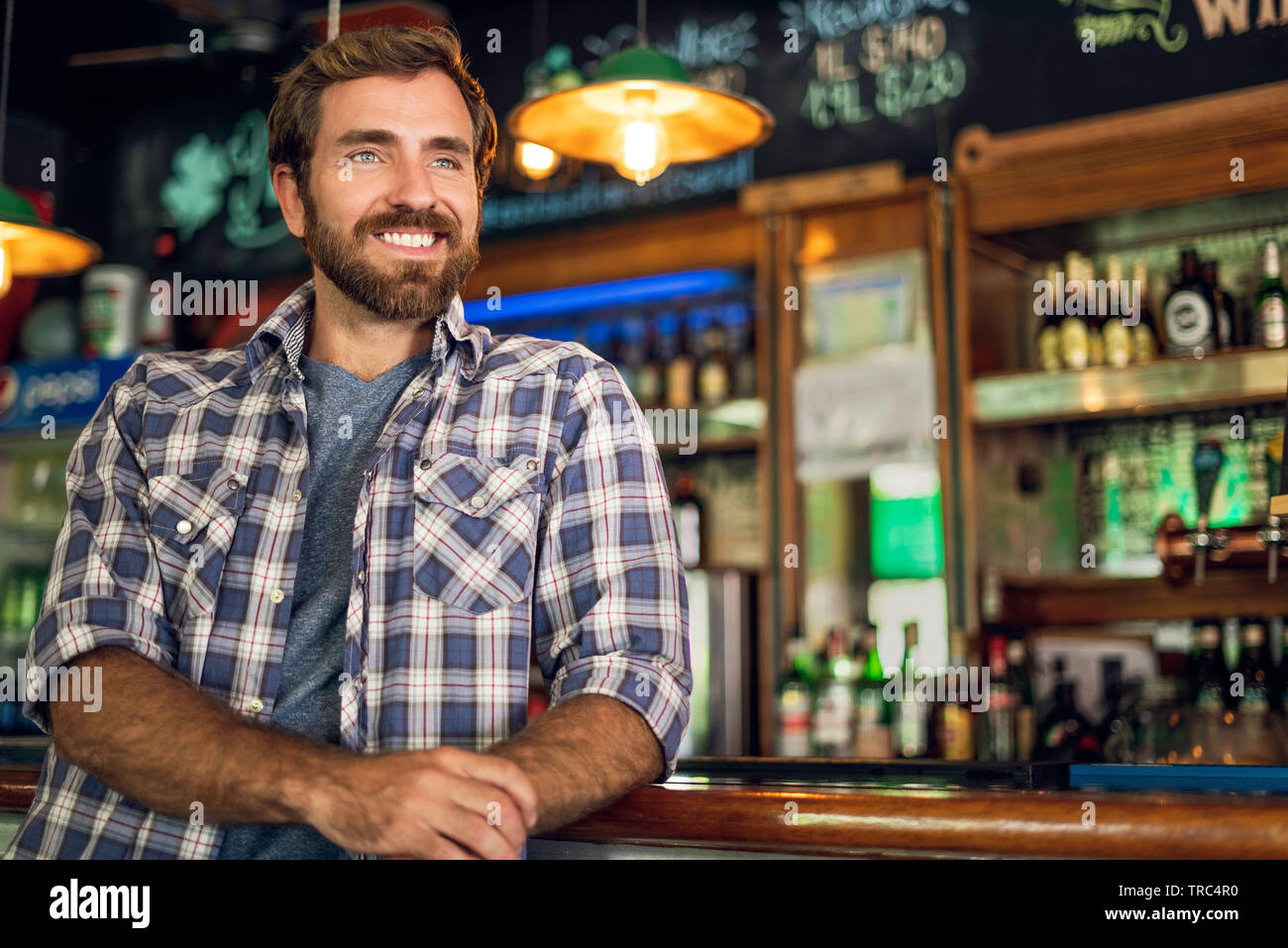 Man leaning against counter on hi-res stock photography and images - Alamy