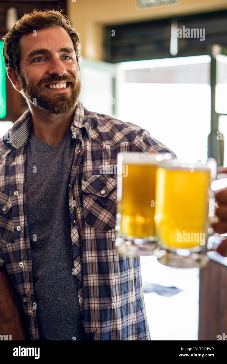 Standing smiling happiness looking away celebration hi-res stock ...