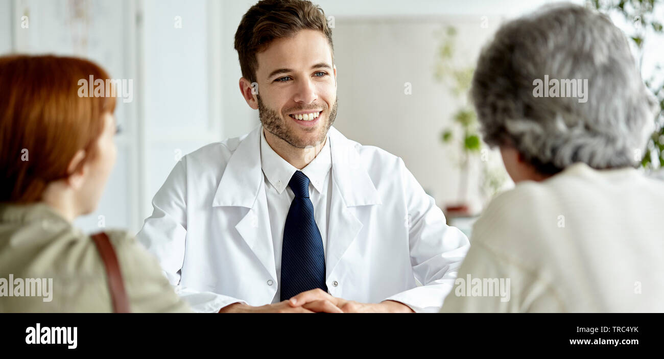 Female doctor talking senior male hi-res stock photography and images ...