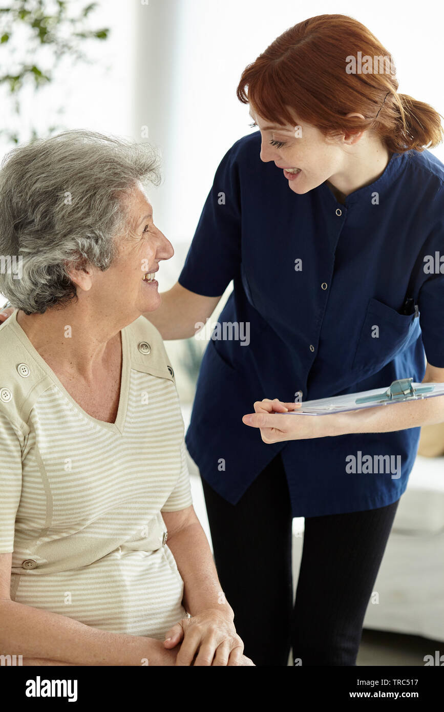 Two persons talking interior hi-res stock photography and images - Alamy