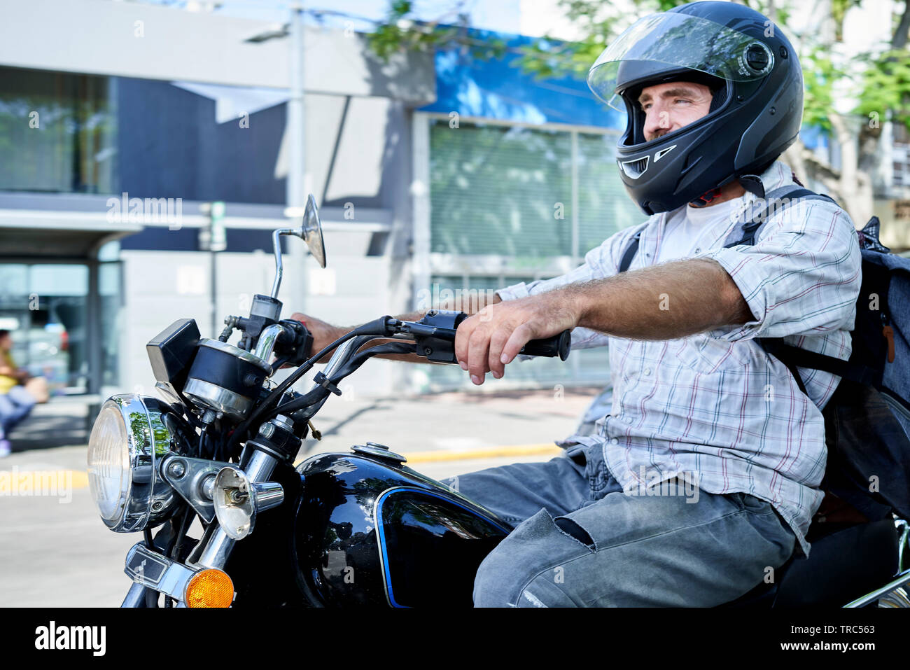 Man riding motorbike Stock Photo - Alamy