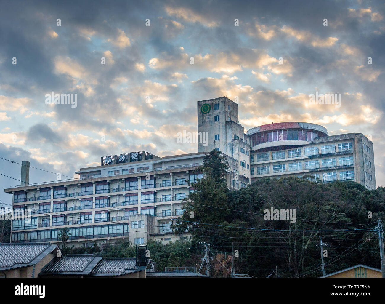 Abandoned and derelict hot-spring resort hotel, at Wakura Onsen seaside ...