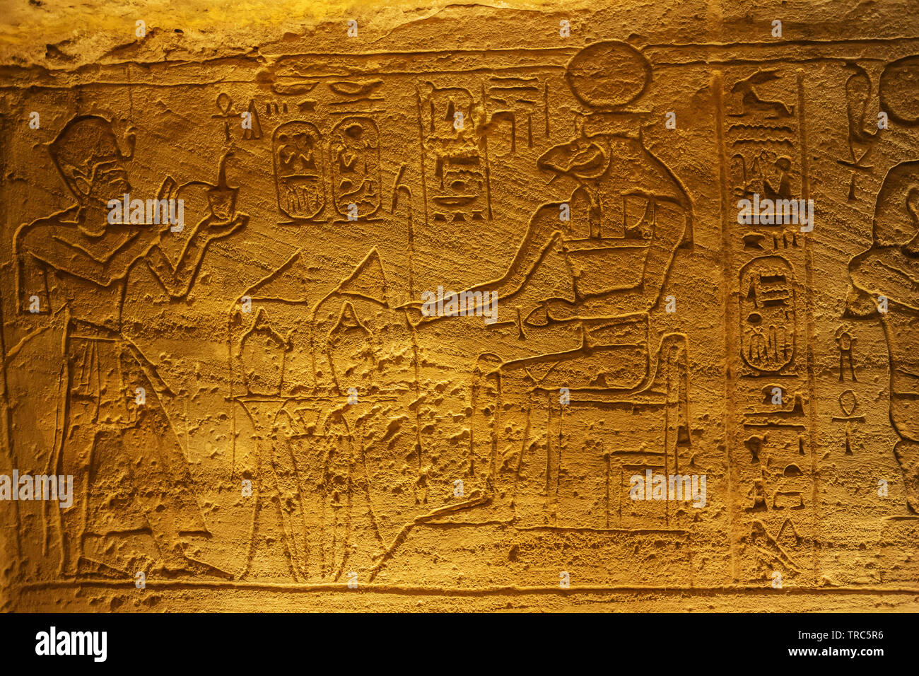 Bas relief of the Pharaoh giving offerings in the Great Temple of Abu ...