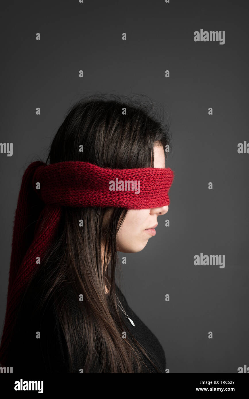 Red scarf blindfold hi-res stock photography and images - Alamy