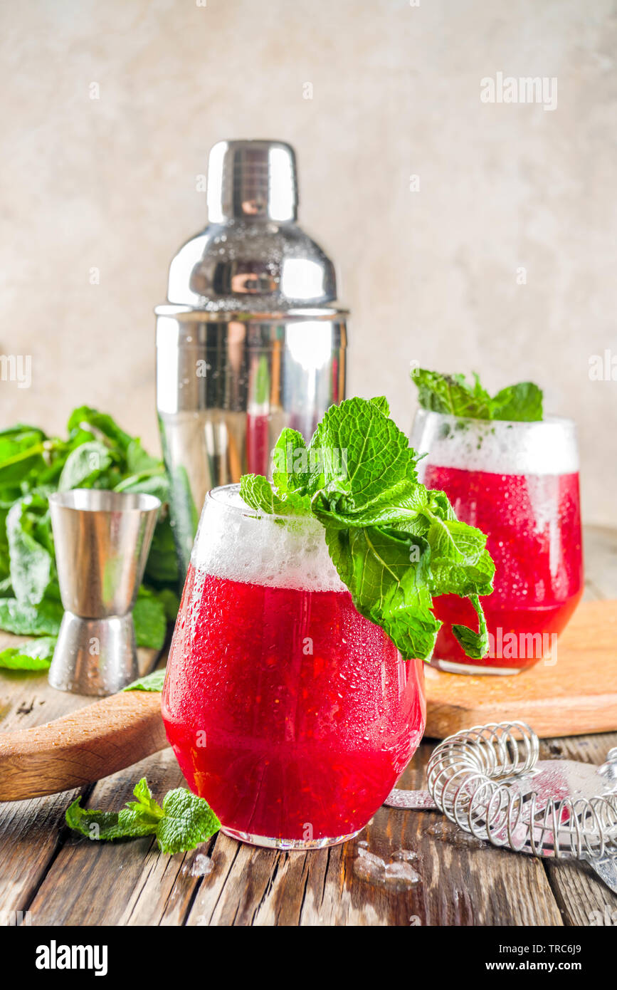 Summer sweet alcohol beverage. Traditional Scandinavian cocktail with ...