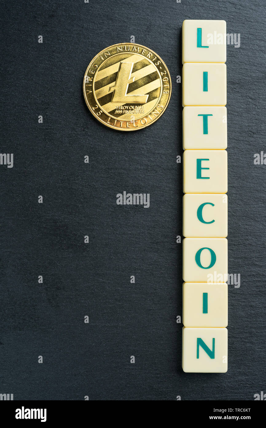 Physical Litecoin gold coin with text made out of letter tiles ...