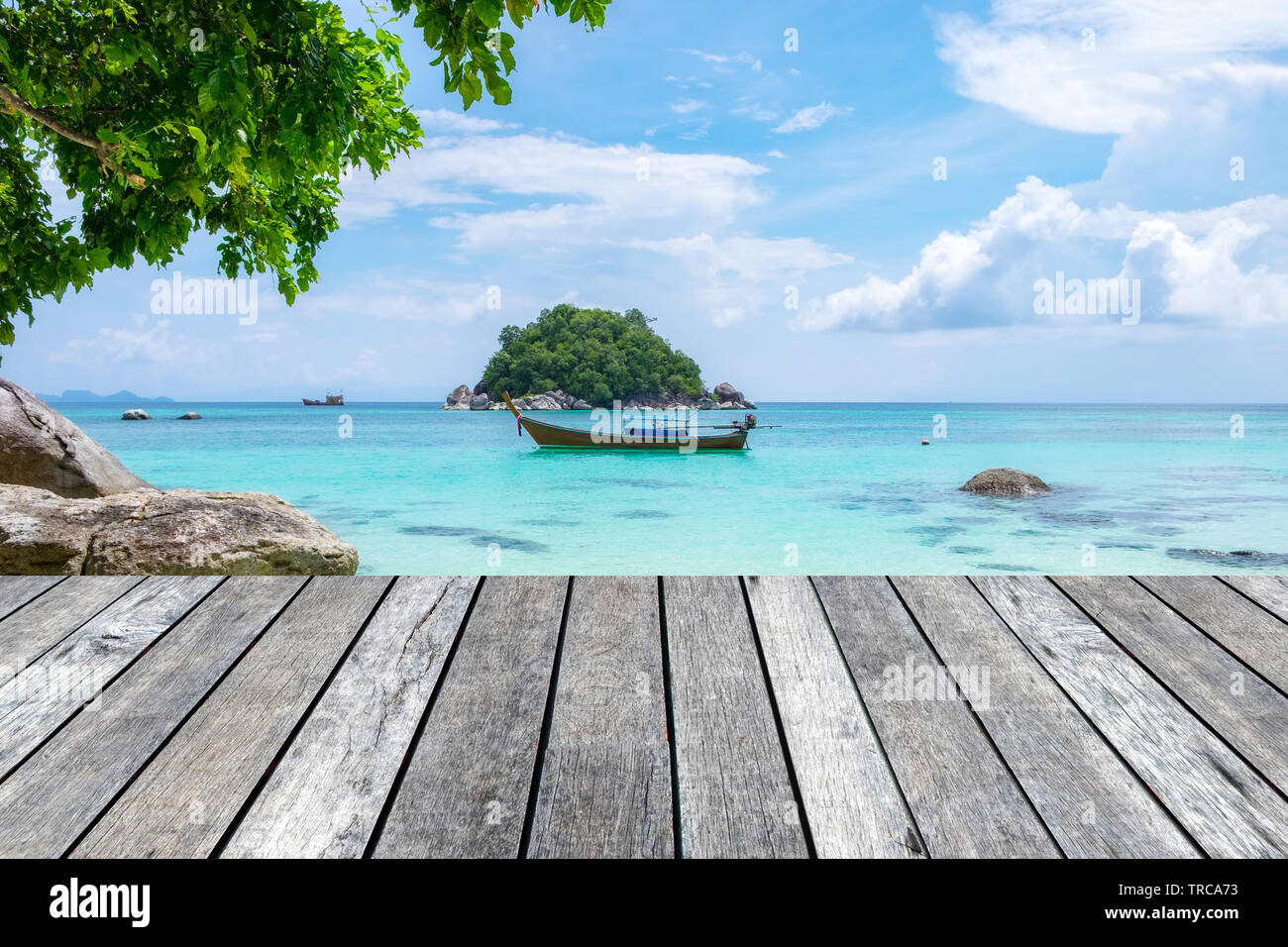 Wood plank gray on crystal sea with long tail boat in lipe island Stock ...