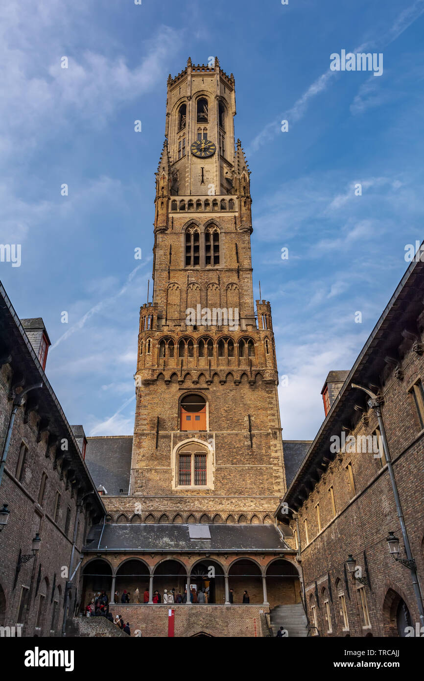 People are waiting in line to climb 83 meter high Belfry of Bruges, the ...