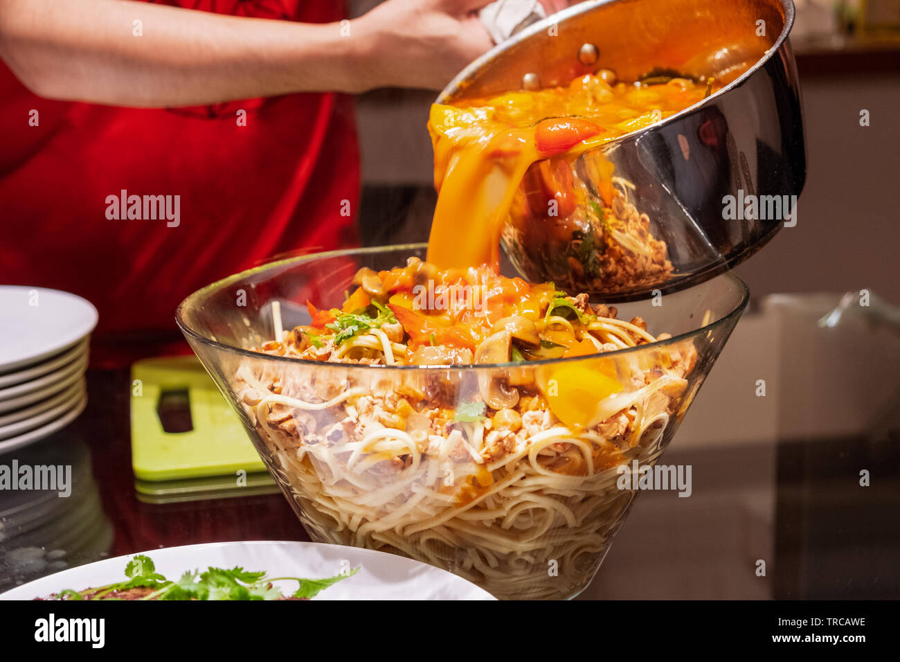 Pouring spaghetti hi-res stock photography and images - Alamy