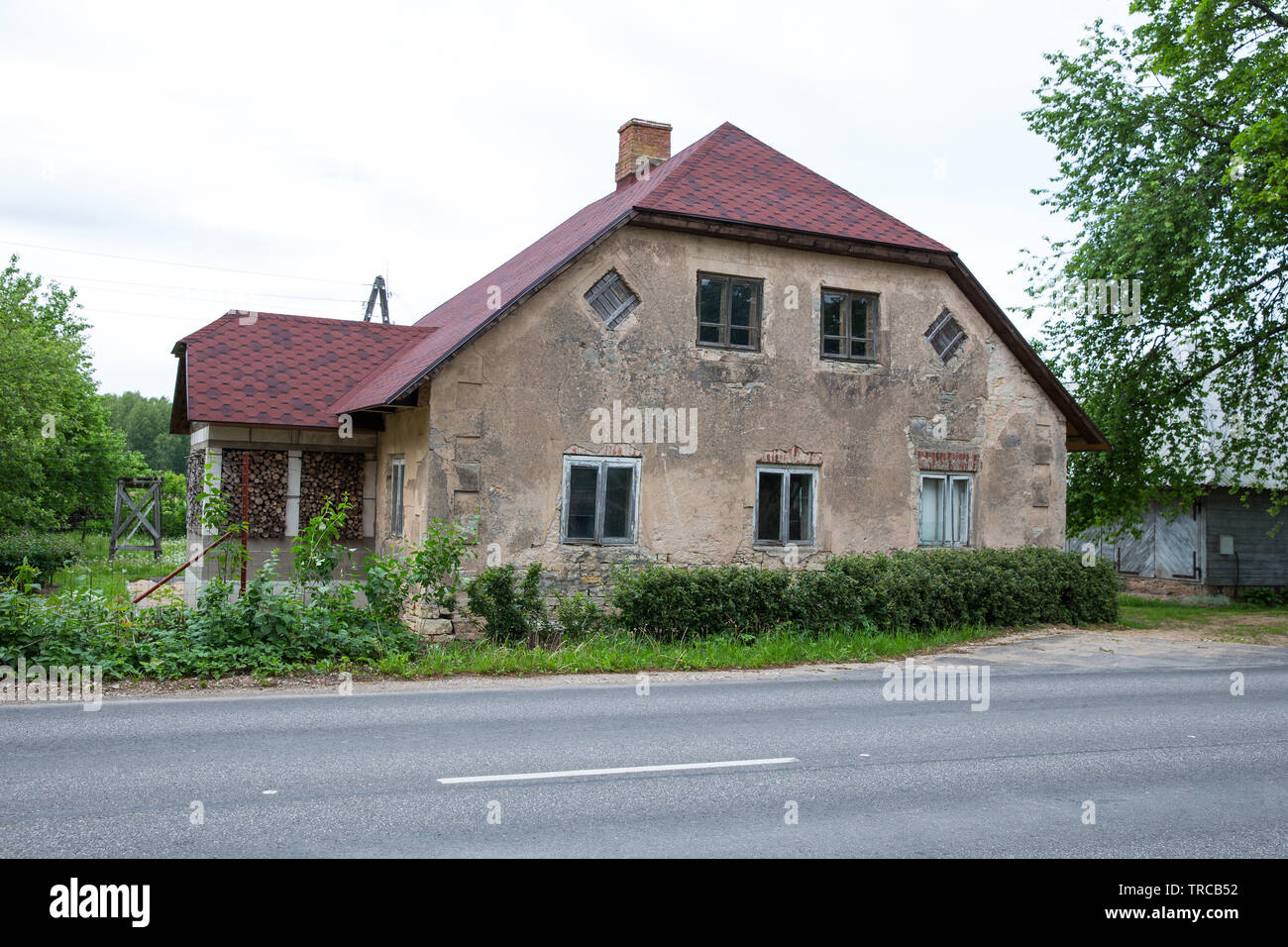 City Priekuli, Latvian Republic. Old house and street view. Windows and ...