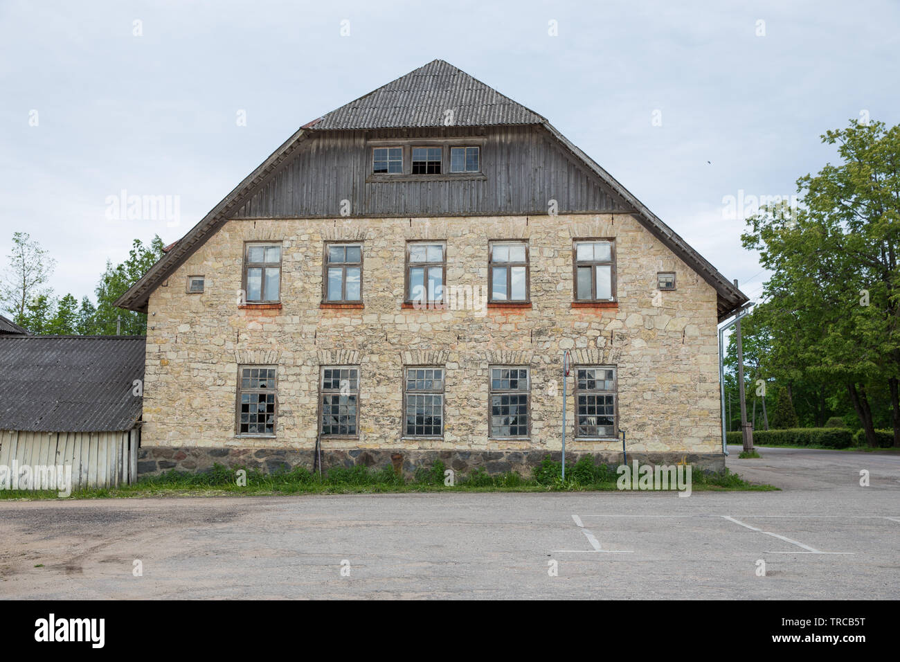 City Priekuli, Latvian Republic. Old house and street view. Windows and ...