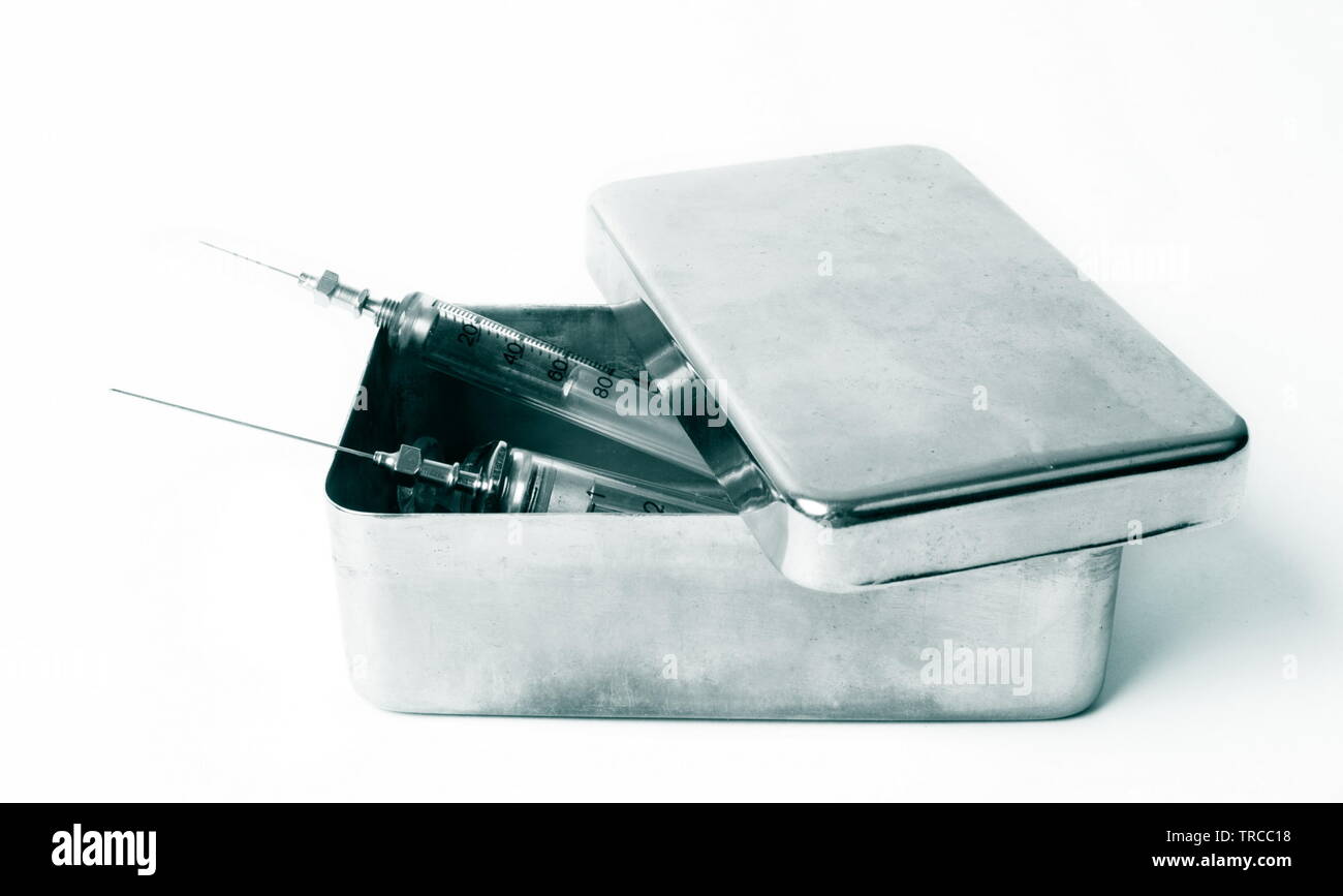 Syringe closeup in box on the white background Stock Photo - Alamy