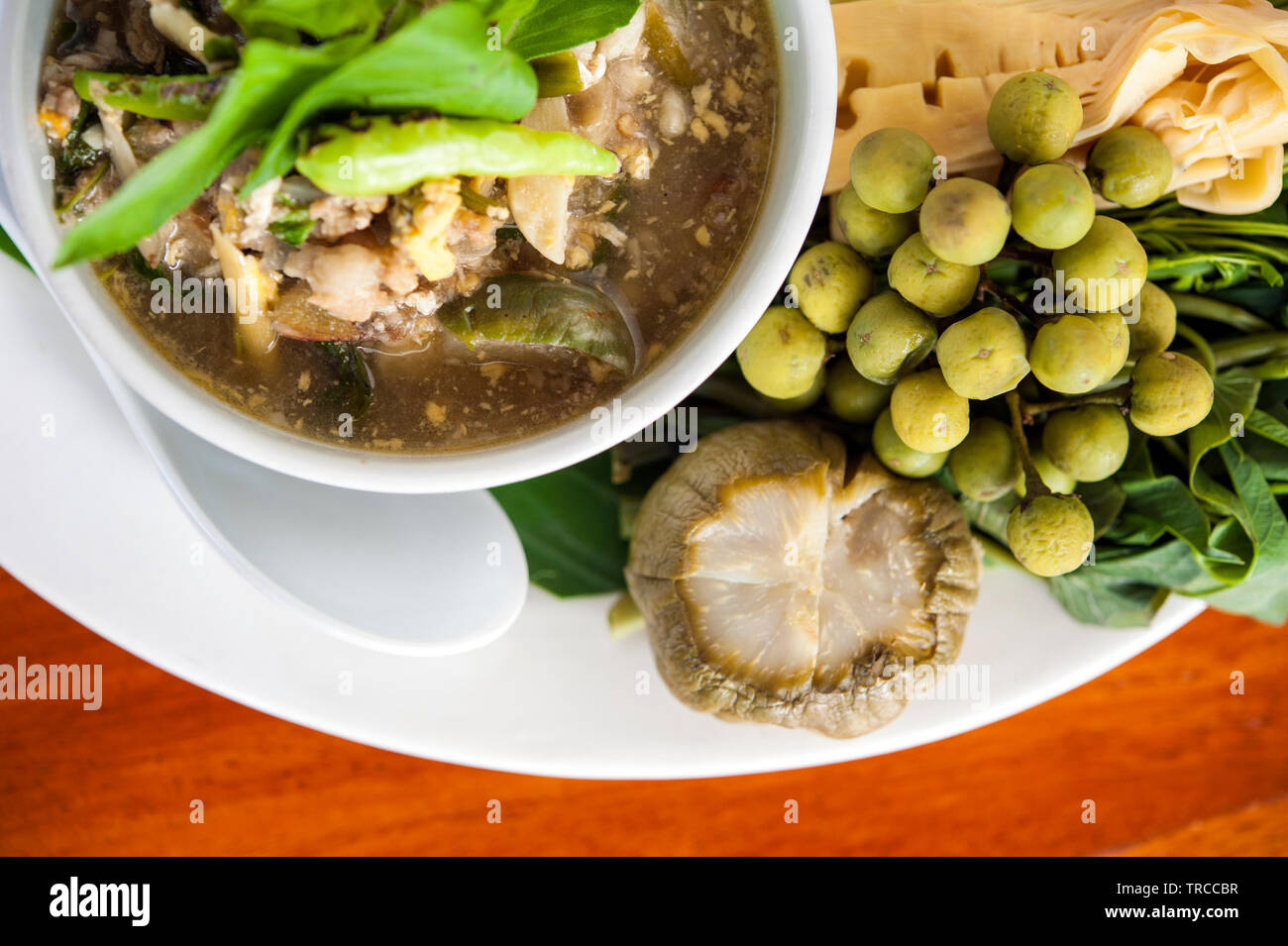 Or Paadaek, rich, robust soup of egg, smoked meat and herbs with ...
