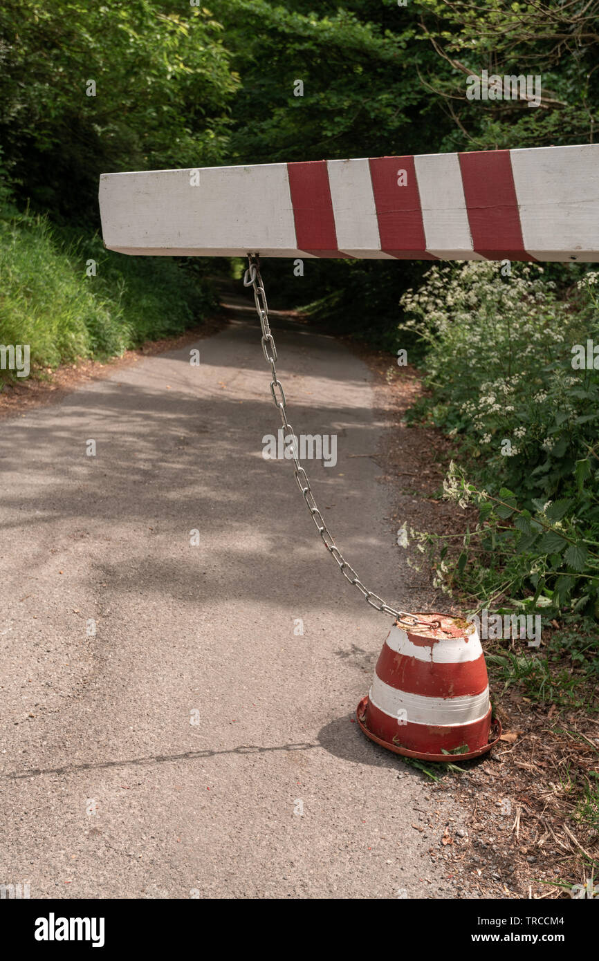 Part open gate barrier onto private path hi-res stock photography and ...