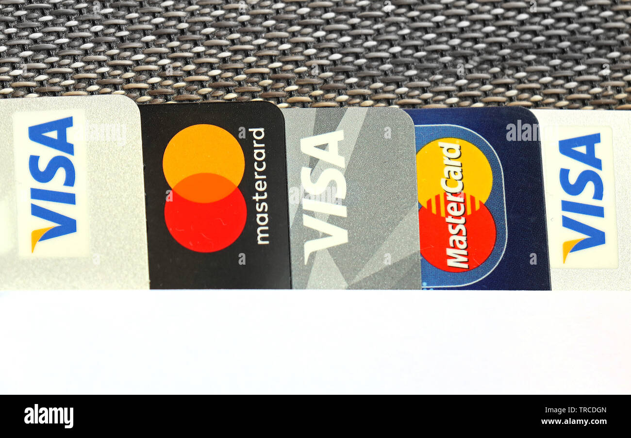 Mastercard credit cards and pile hi-res stock photography and images ...
