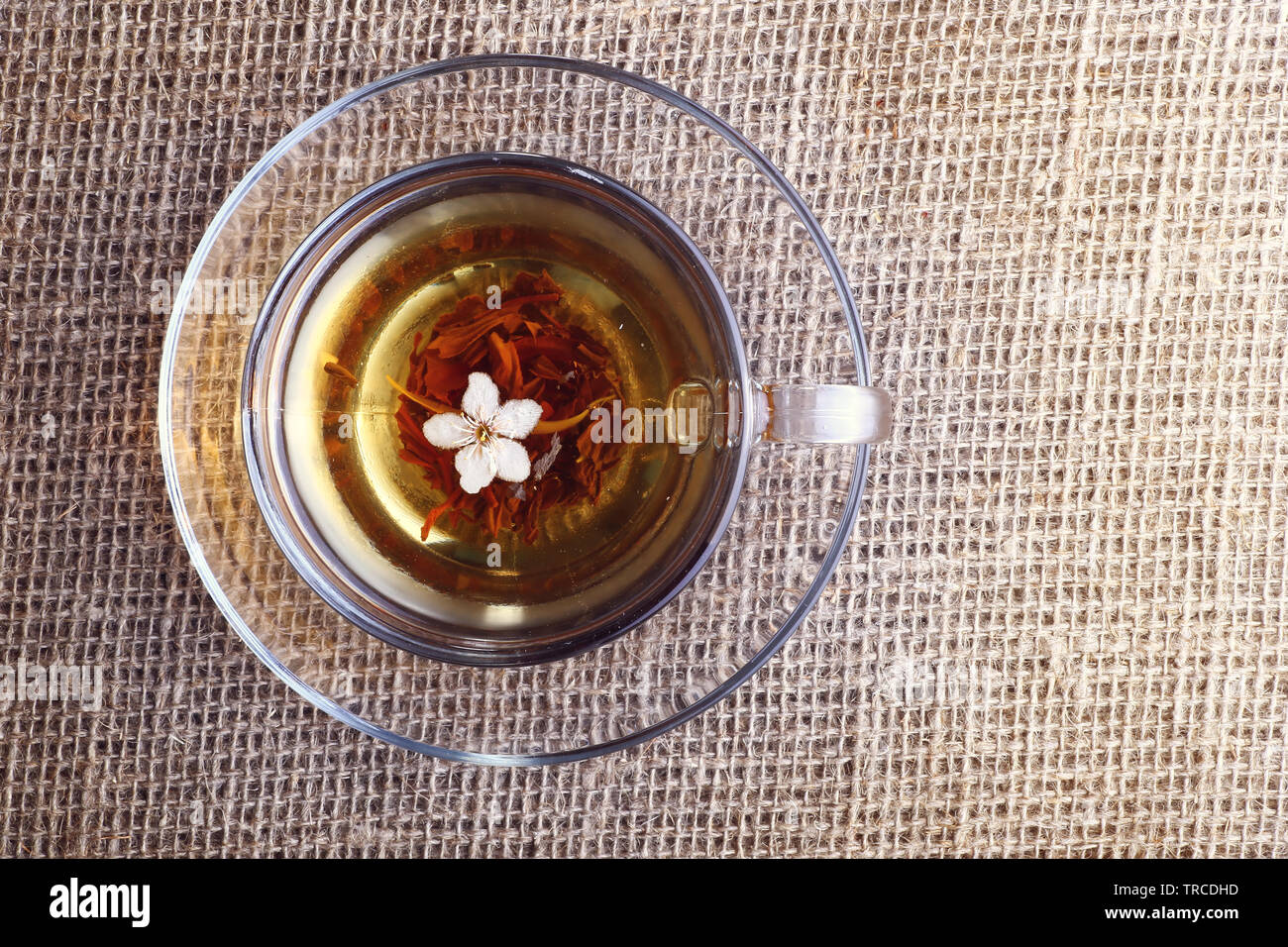 cup of black tea with apricot flower on canvas , top view Stock Photo ...