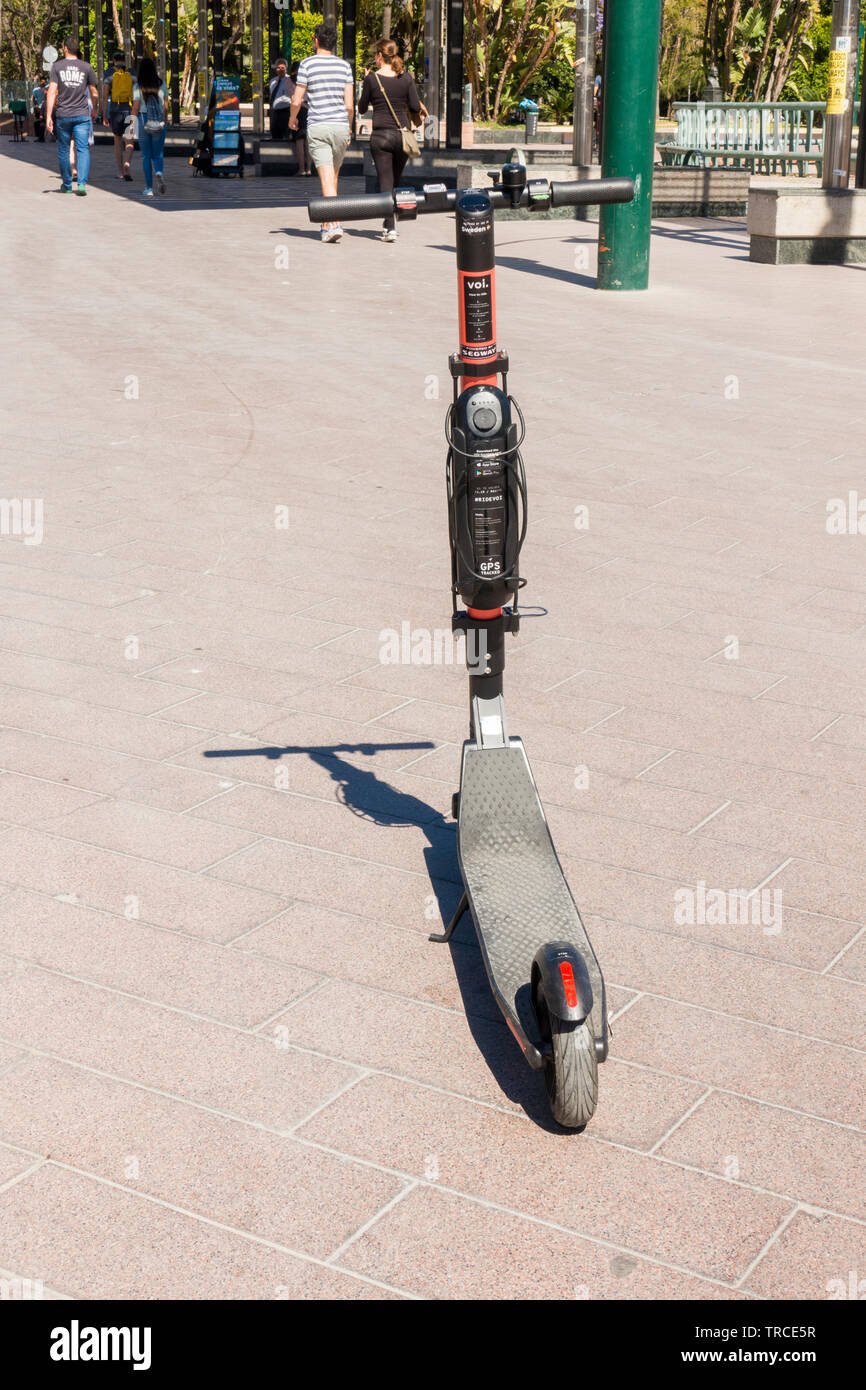 Electric scooter parked on a pedestrian walkway. Malaga, Andalusia ...