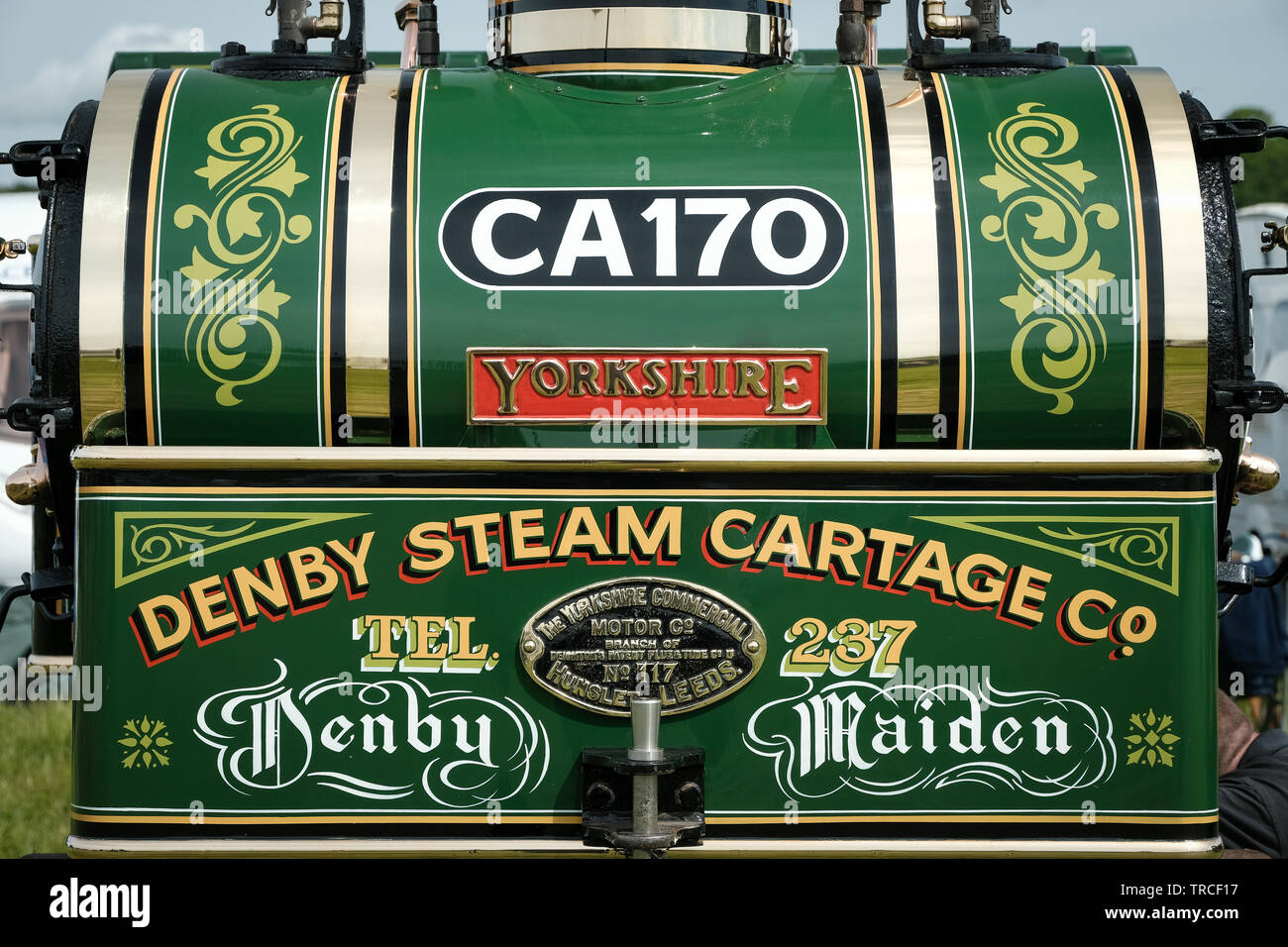 The side of a green, steam driven traction engine Stock Photo - Alamy