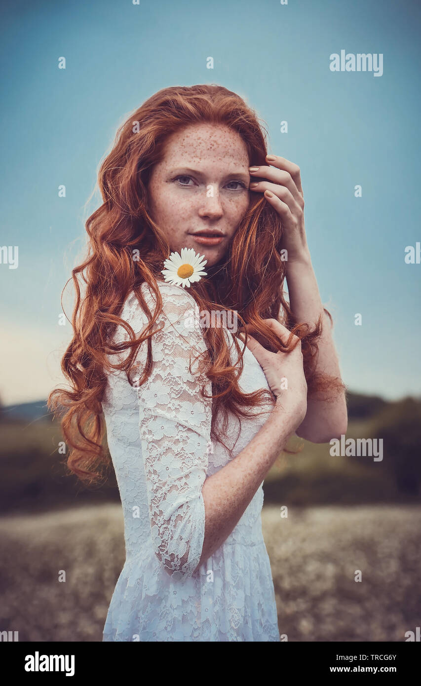 Beautiful woman enjoying field, pretty girl relaxing outdoor, having ...