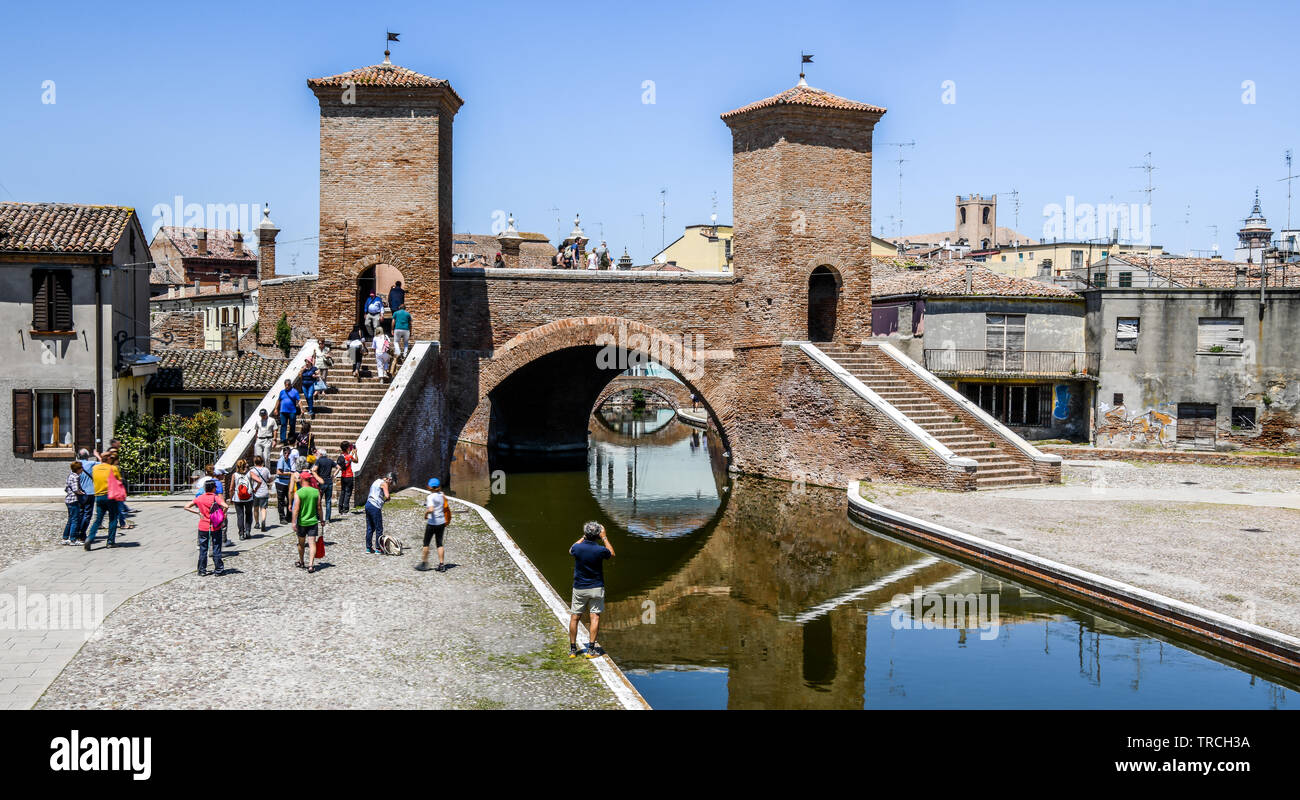 Comacchio, Emilia Romagna, Italy - 2 June 2019: People visit Trepponti ...