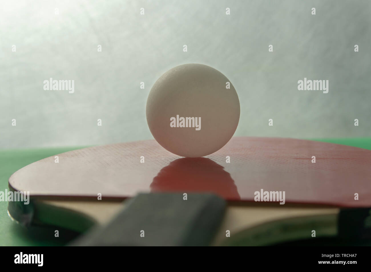 Ping pong equipment. Table tennis bats and ball. Selective focus Stock ...