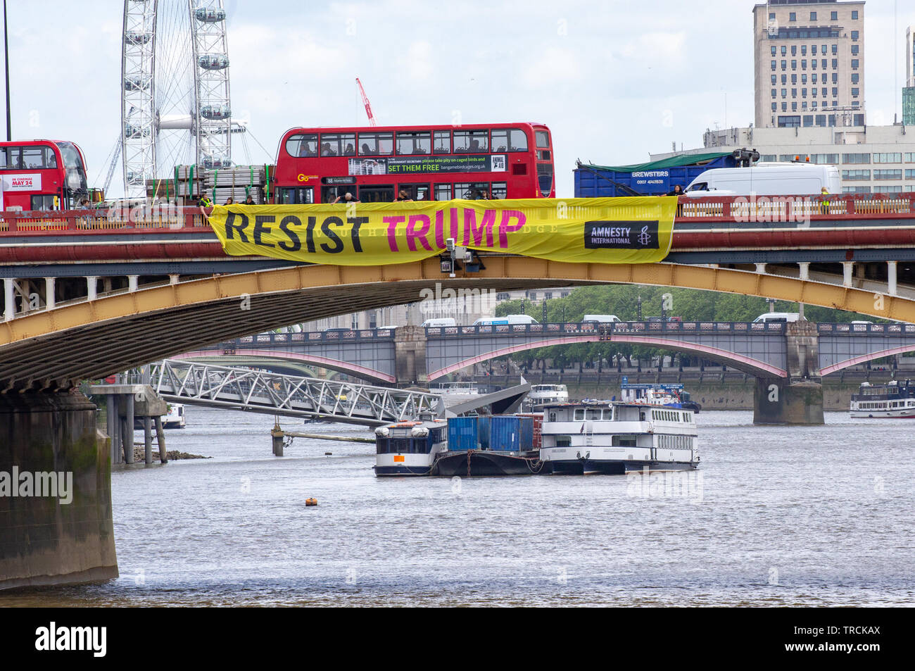 Amnesty international unfurls giant resist banners hi-res stock ...