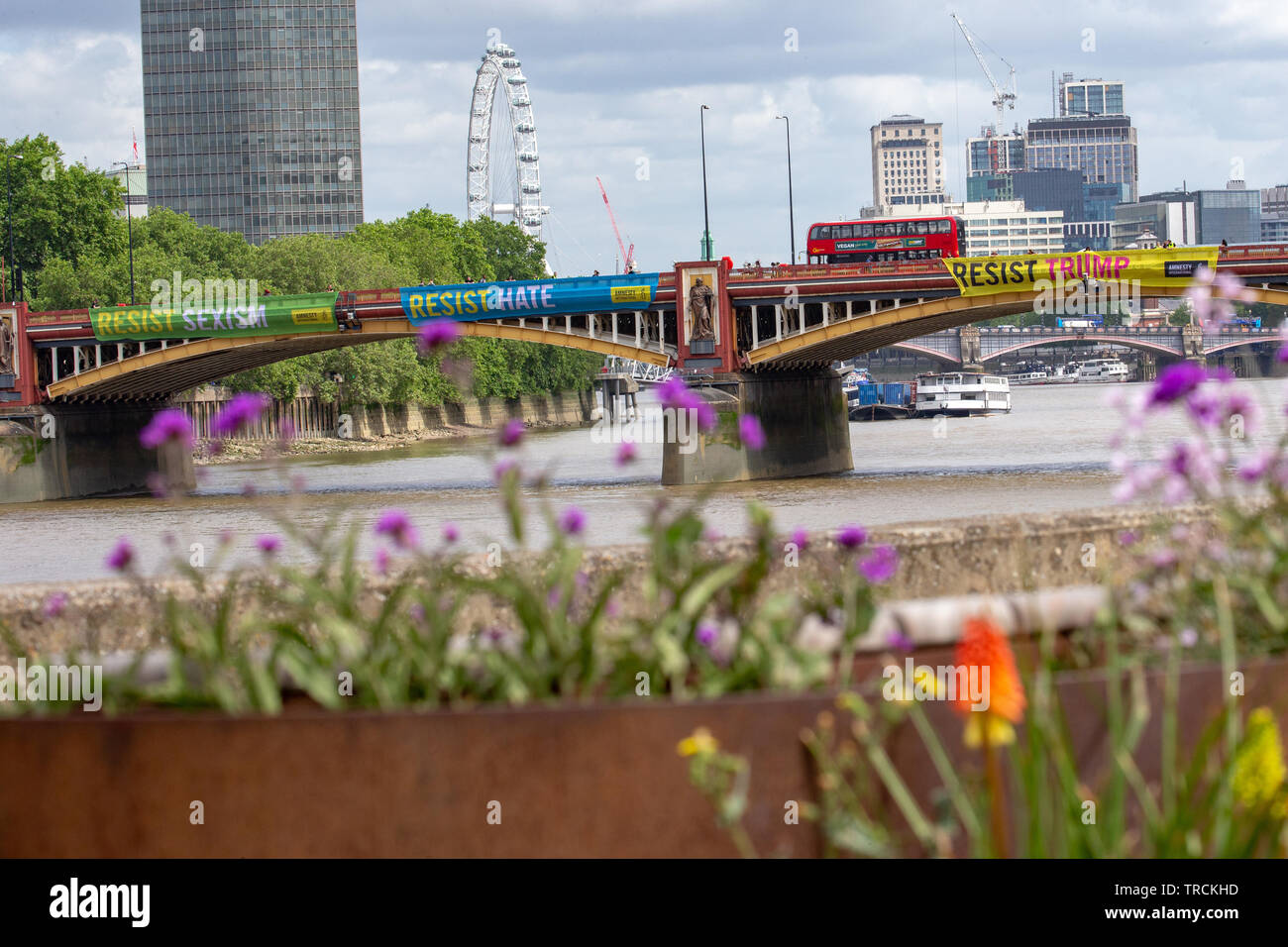 Amnesty International unfurls giant “Resist” banners in front of the US ...