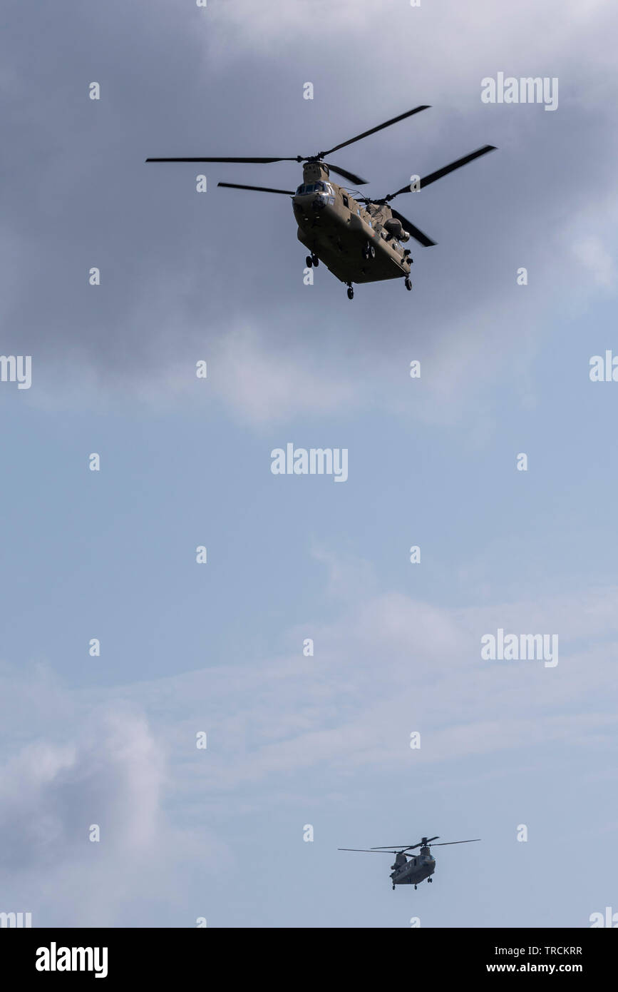 Two US Army Boeing Chinook transport helicopters flying as part of the ...