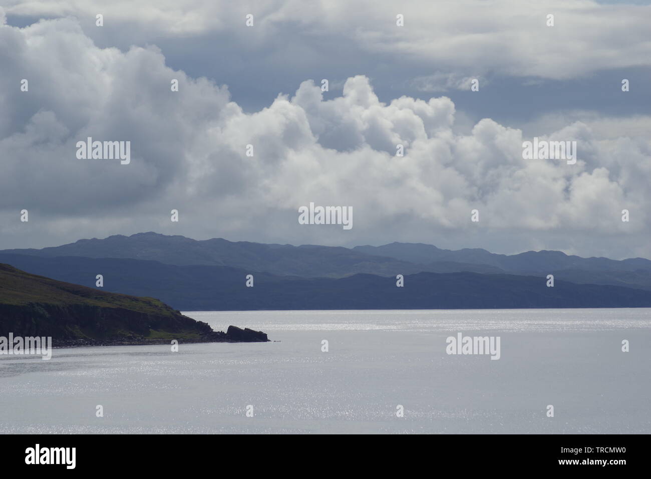 Cliffs and Brooding Clouds beyond a Calm Loch Eishort. Isle of Skye ...