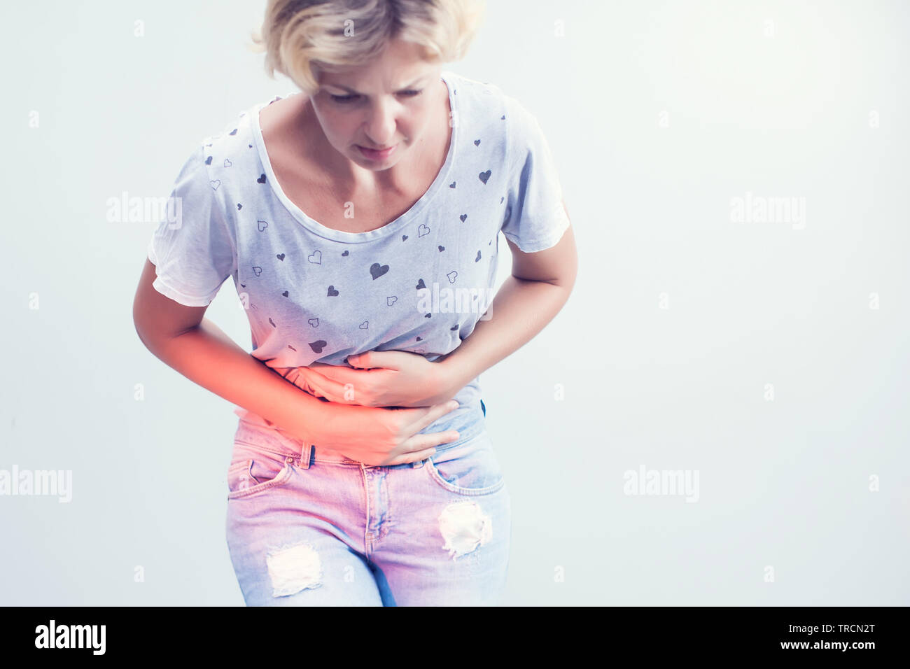 Stomach pain or menstrual pain. Woman with pains in abdomen. Female ...