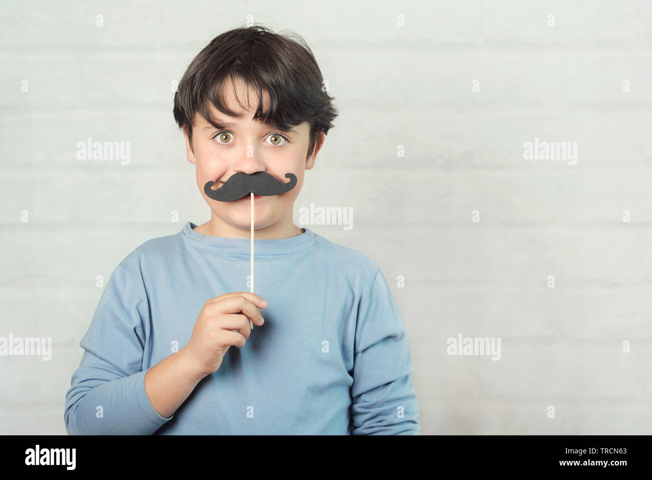 Fake smile boy hi-res stock photography and images - Alamy
