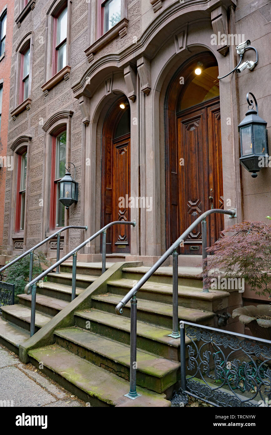 front steps of elegant old brownstone style townhouses or apartment ...