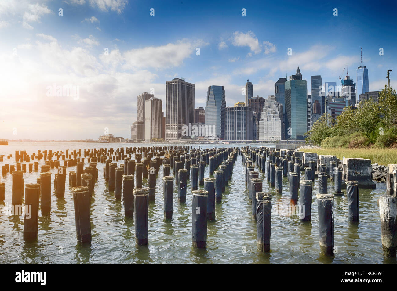 Old pier pylons and Downtown Manhattan, New York City Stock Photo - Alamy
