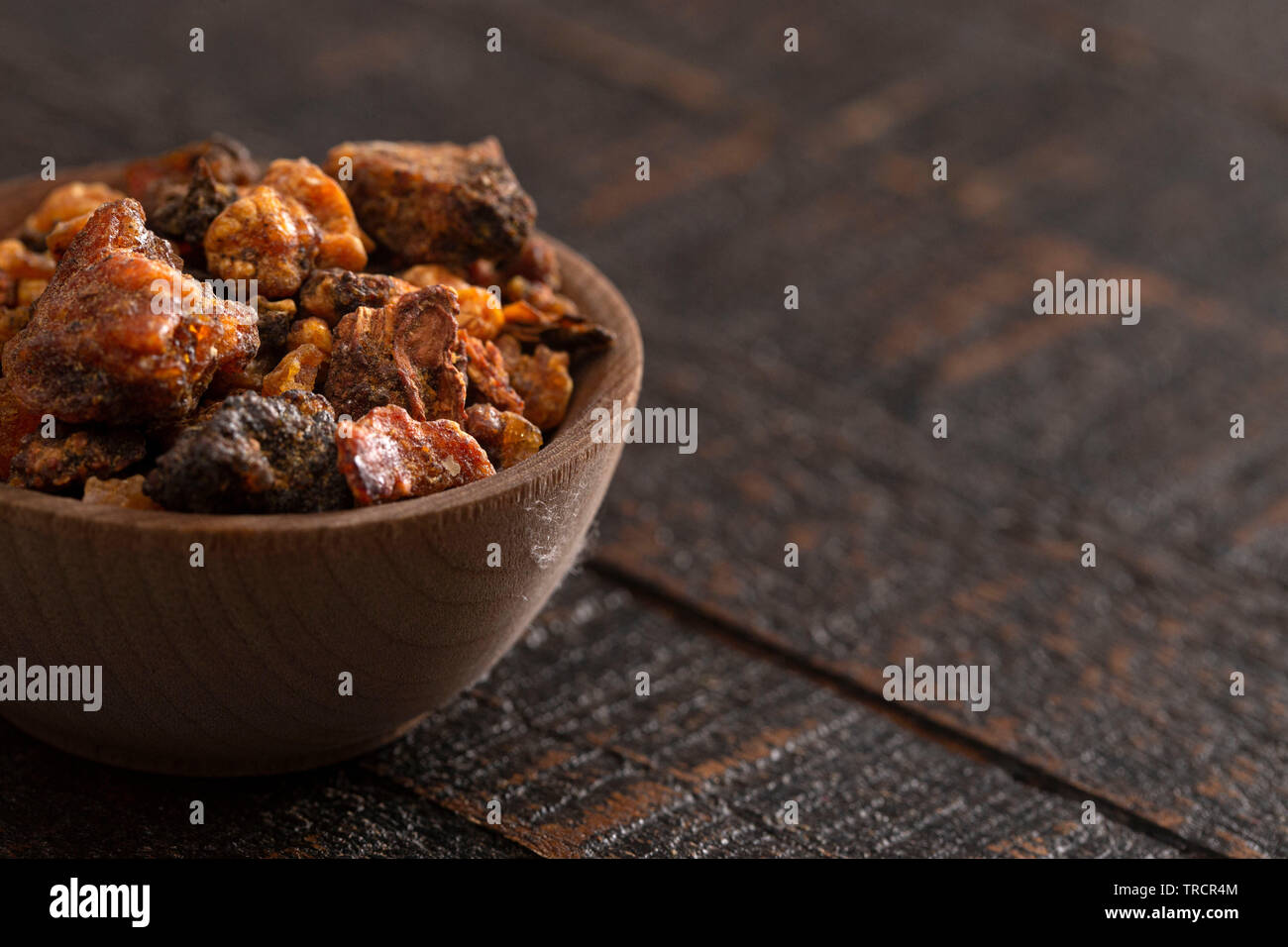 Sweet Myrrh Opoponax on a Distressed Wood table Stock Photo - Alamy