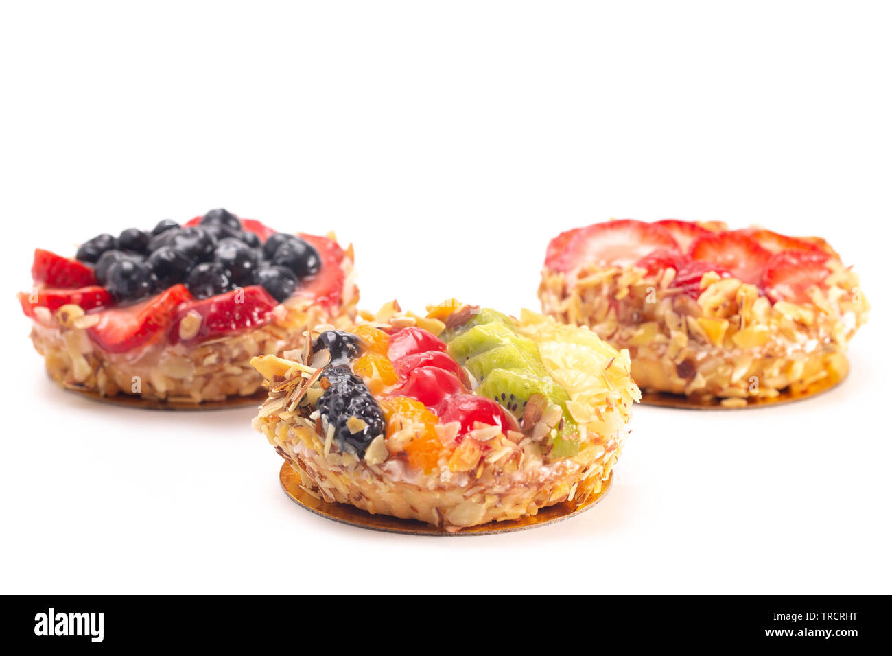 Three French Fruit Pastries Isolated on a White Background Stock Photo ...