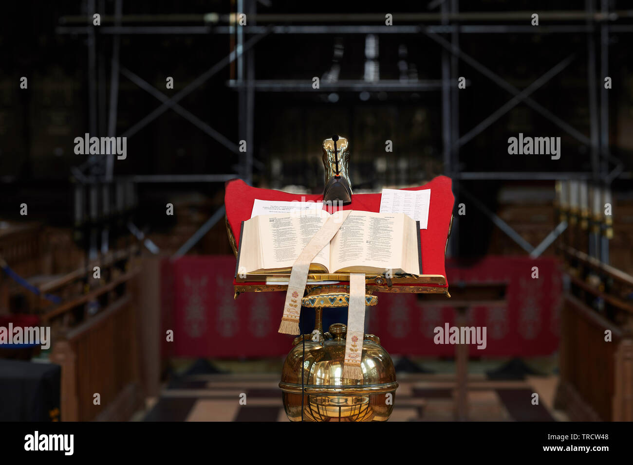 Open Bible on a lectern in the choir of York Minster cathedral, England ...