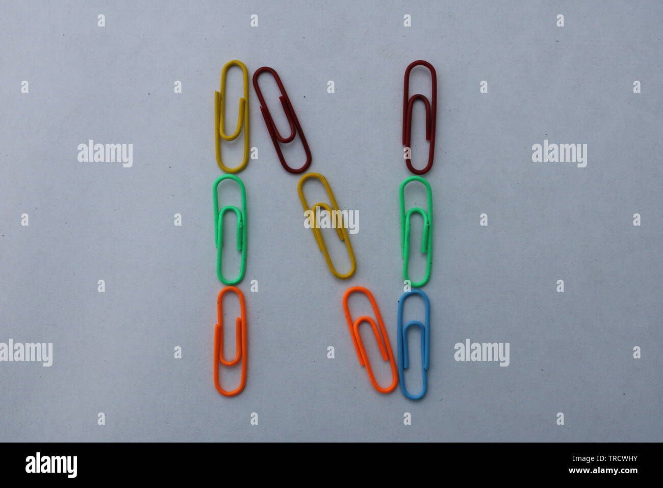 Letter N made with colorful paper clips on white background Stock Photo ...