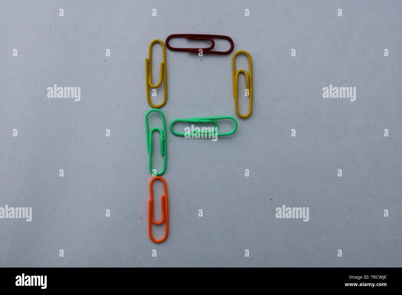 Letter P made with colorful paper clips on white background Stock Photo ...