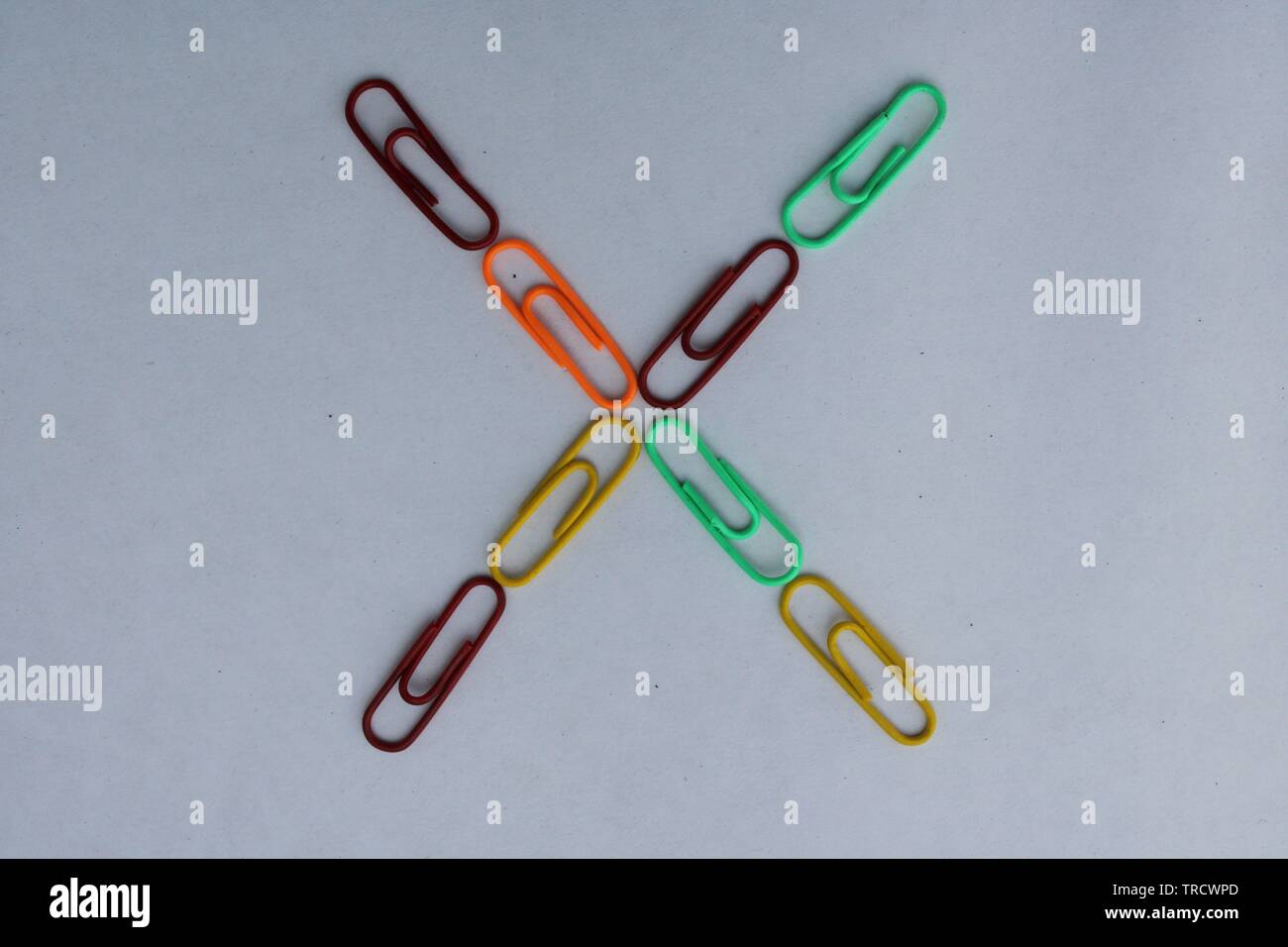 Letter X made with colorful paper clips on white background Stock Photo ...