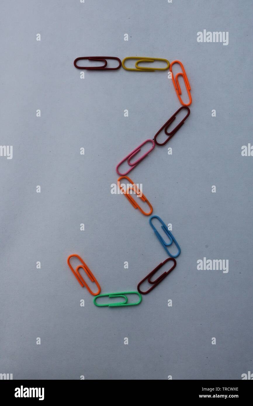 Number 3 made with colorful paper clips on white background Stock Photo ...