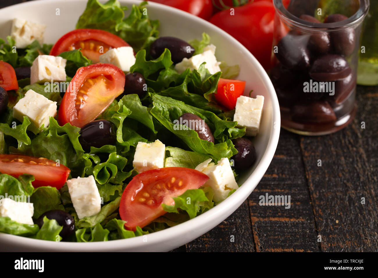 Fresh Greek Salad with Olives Tomatos and Feta Cheese on a Rustic Wood ...