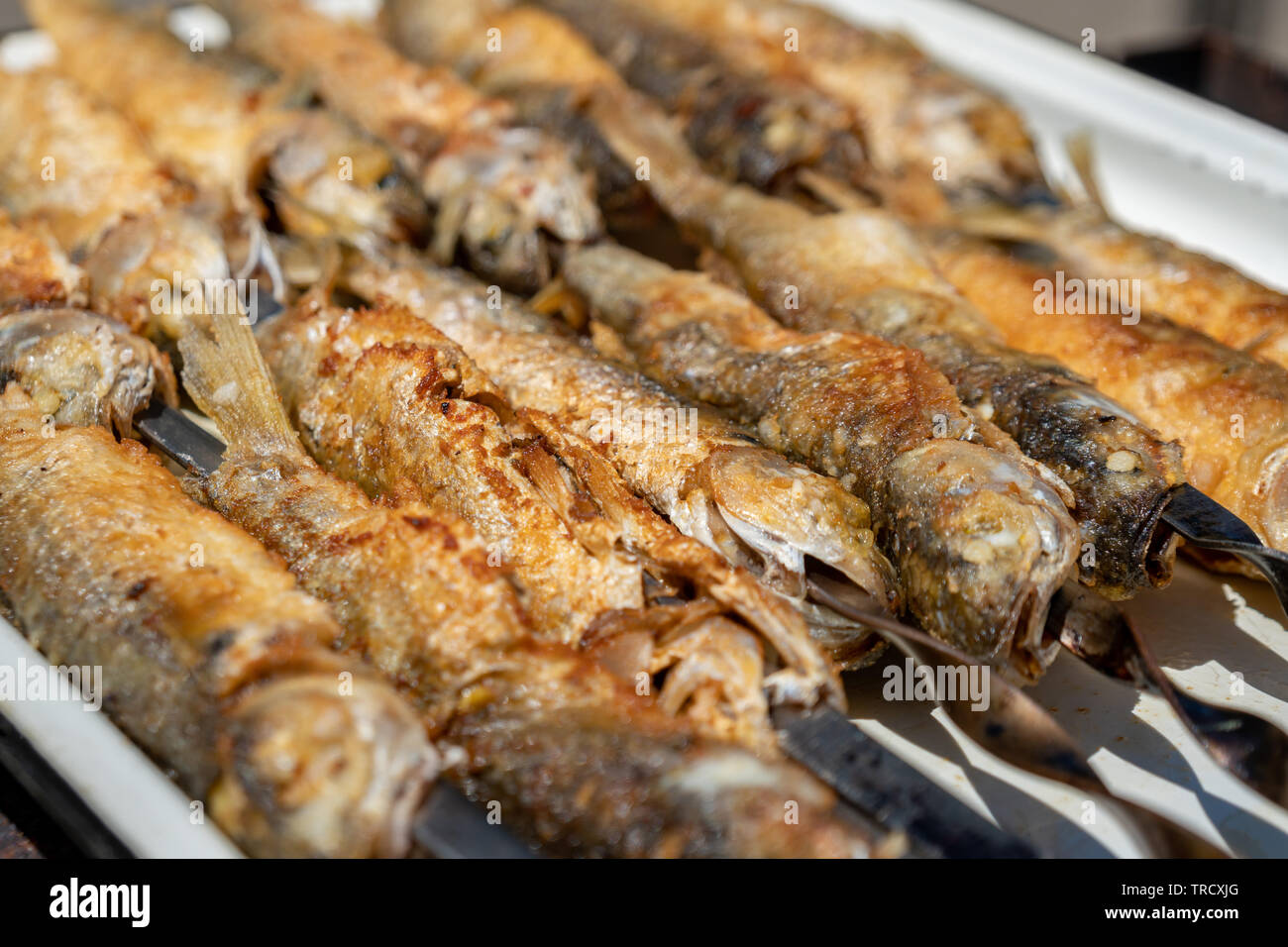Fried small fish crispy deep hi-res stock photography and images - Alamy