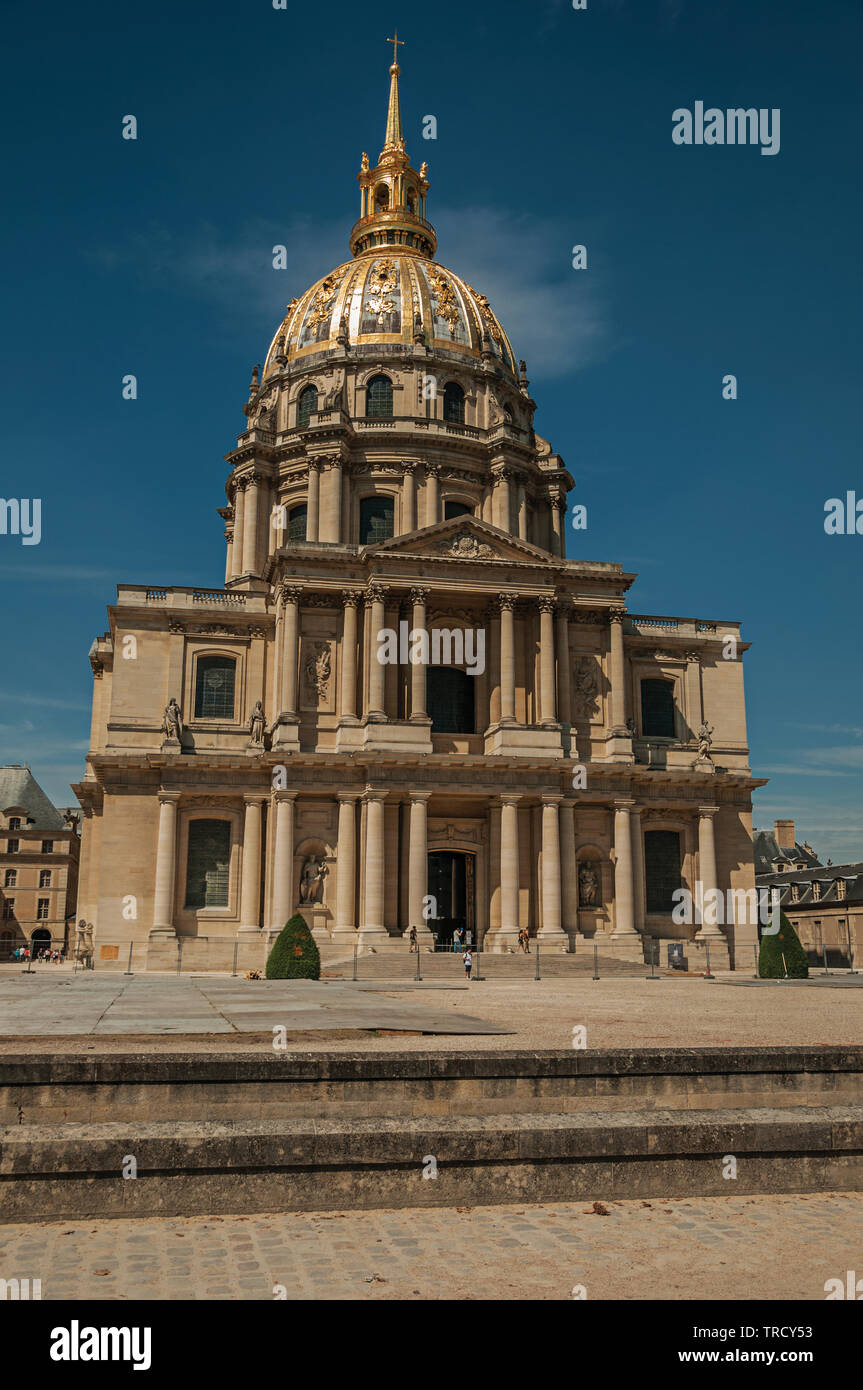 Front facade of Les Invalides Palace with the golden dome in a sunny ...