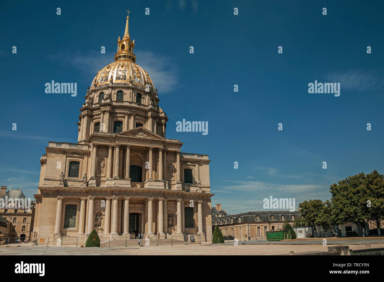 Trees and Front facade of Les Invalides Palace with the golden dome in ...