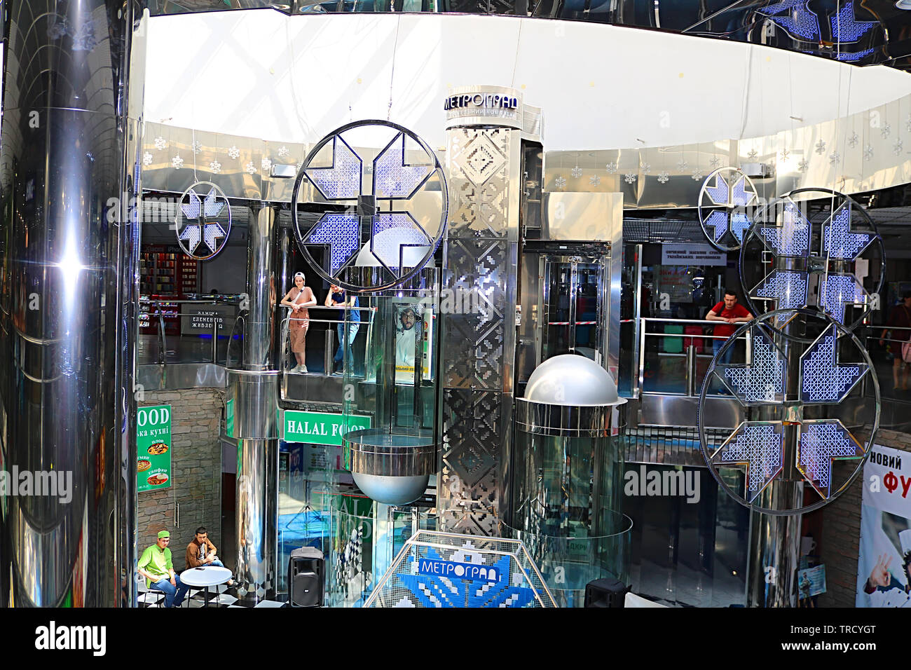 KYIV, UKRAINE - MAY 18, 2019: Interior of underground shopping center ...