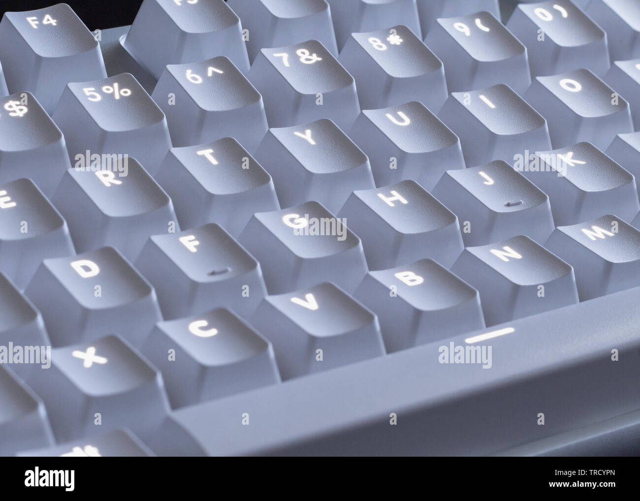 white LED glowing mechanical keyboard - close up Stock Photo - Alamy
