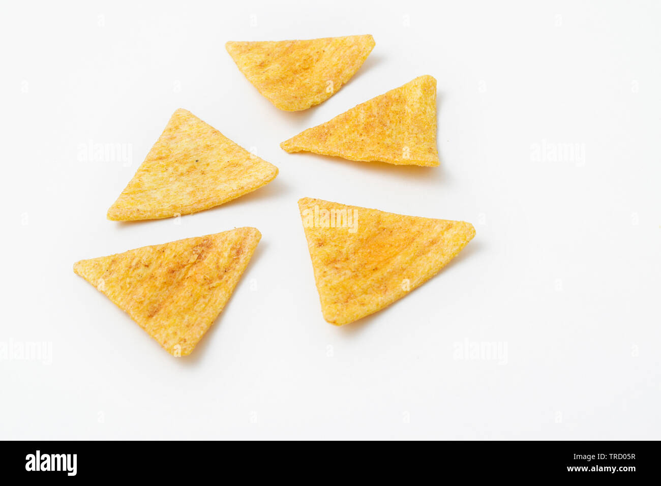 triangle nacho chips isolated on white background Stock Photo - Alamy