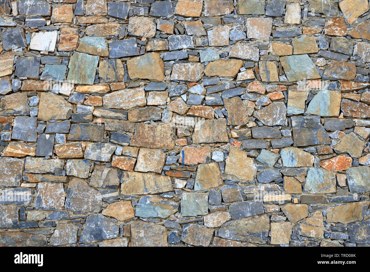 Big gray wall made from stone bricks Stock Photo - Alamy